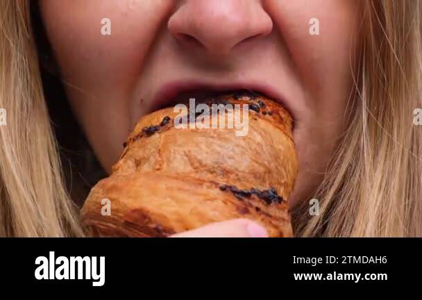 Woman eating croissant paper Stock Videos & Footage - HD and 4K Video ...