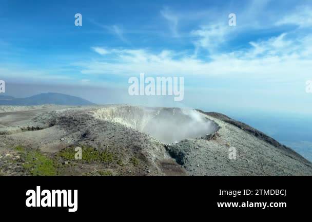 Seeing the inside of a volcano crater with smoke in east Java ...