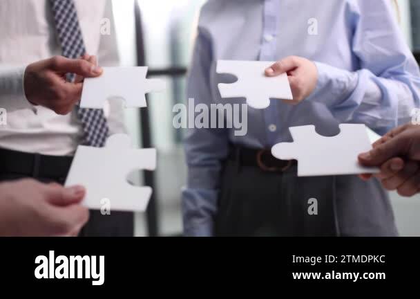 The team assembles the puzzle while standing in the office. joint ... The team assembles the puzzle while standing in the office. joint ...