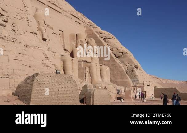 Four colossal statues of Ramesses II guard the entrance to his famous ...