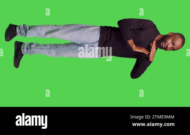 Vertical video: Side view of young model showing timeout symbol in ...