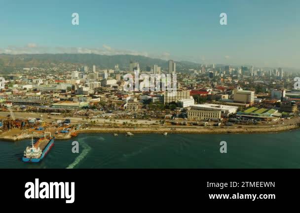 Cityscape: Cebu city with modern buildings, skyscrapers and seaport ...