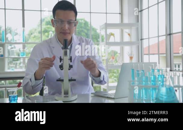 Research concept of 4k resolution. Asian scientists are examining the ...