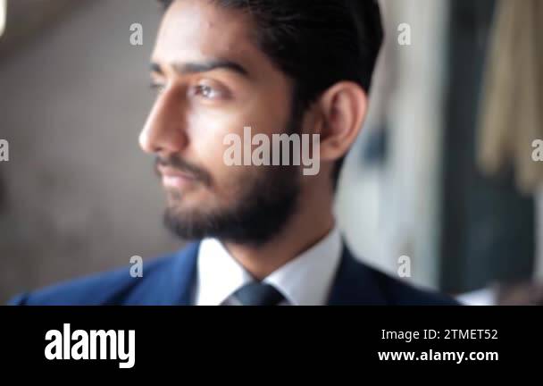Angry exhausted CEO scolding his employee at work. A man in a suit is ...