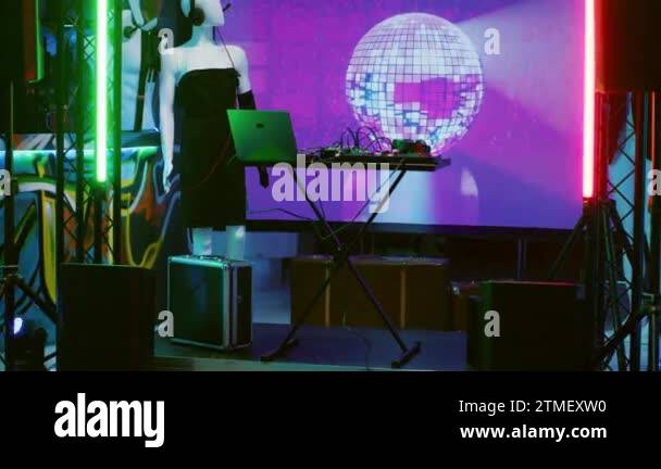 Empty sound stage with DJ panel used for live music show at nightclub ...