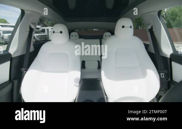 Empty Tesla Model Y car self driving using autopilot technology on ...