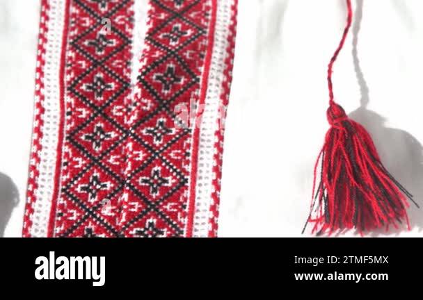 Ukrainian clothes embroidered shirt. Red and black threads background ...