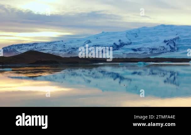 Frozen lake with mountains and spectacular snowy landscape, freezing ...