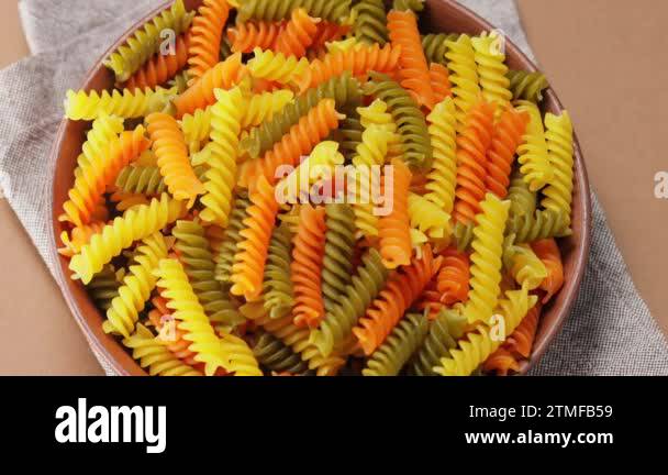 Uncooked tricolor fusilli pasta Stock Videos & Footage - HD and 4K ...