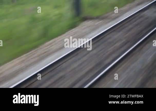 The journey by rail. Shot from the window of a moving train, railroad ...