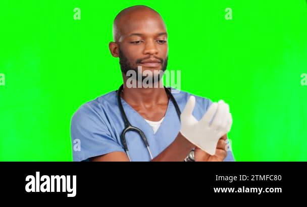 Surgeon gloves, happy face and green screen black man ready for medical ...