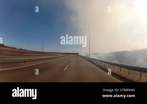 Smoke over road Stock Videos & Footage - HD and 4K Video Clips - Alamy