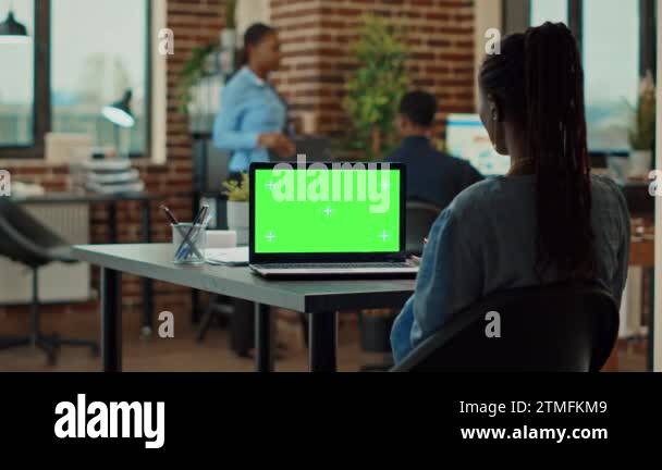 Corporate person using green screen in office, checking business ...