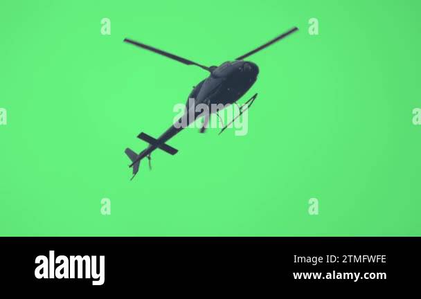 Helicopter flying on green screen low angle camera. Realistic ...
