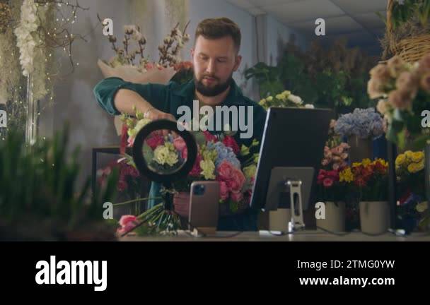 Male florist collects bouquet Stock Videos & Footage - HD and 4K Video ...