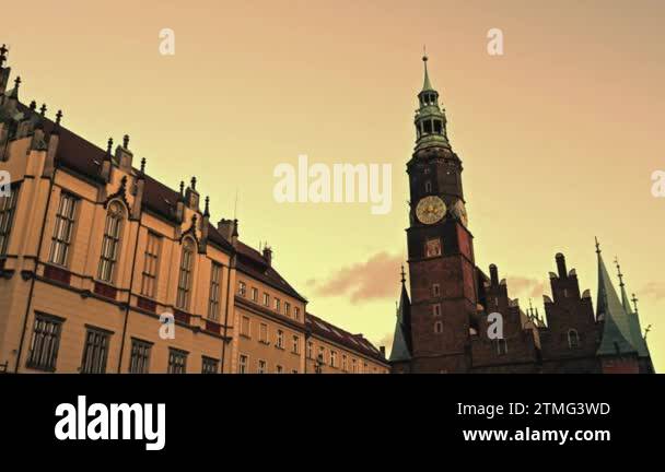 Medieval tower with clock in Wroclaw city in Poland and sky with clouds ...