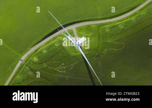 Aerial top down view of wind turbine providing sustainable energy by ...