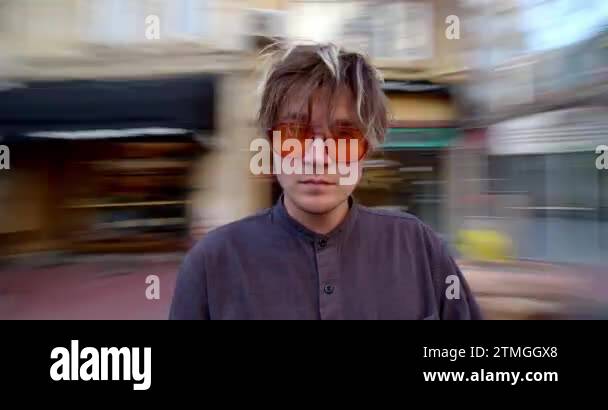 The guy spinning around in the middle of town. Point of view. Body ...