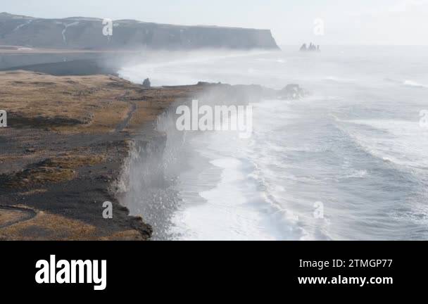 Ocean coastline in Iceland, Volcanic mountains, black sand beach with ...