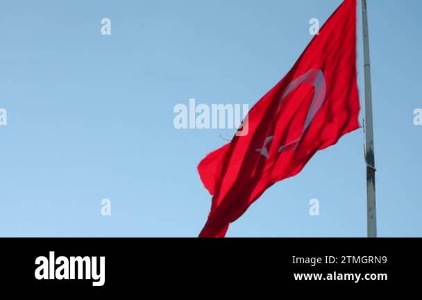 Waving Turkish Flag on blue sky background 4k video. Public holidays of ...