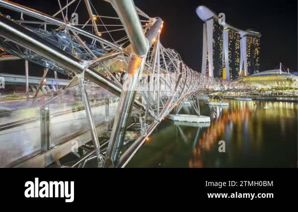 People on Helix Bridge, Singapore Stock Video Footage - Alamy