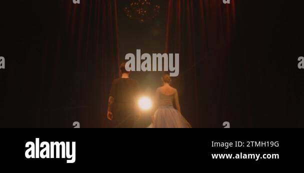 Curtains open, ballet dancers come out and perform dance on classic ...