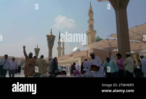 Muslims walking outside haram Masjid (mosque) Nabawi in Al Madinah ...