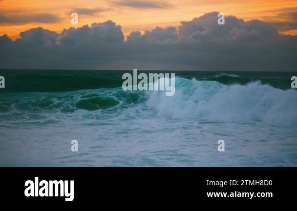 Storm sea rolling dawn coast in slow motion. Amazing endless seascape ...