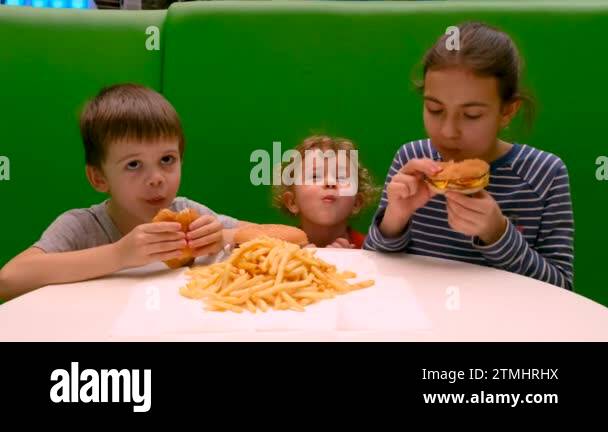Children eat fries Stock Videos & Footage - HD and 4K Video Clips - Alamy