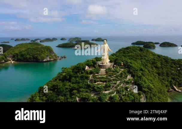 One hundred Islands national Park and the statue of Christ located on ...