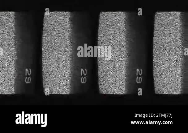 Vertical video. TV glitch screen static noise. Old surveillance monitor ...