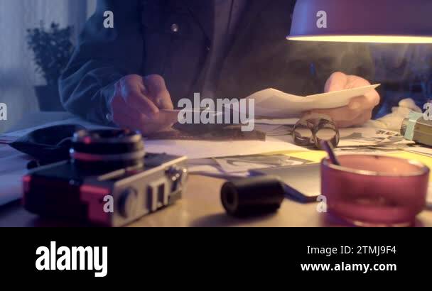 Detective table Stock Videos & Footage - HD and 4K Video Clips - Alamy