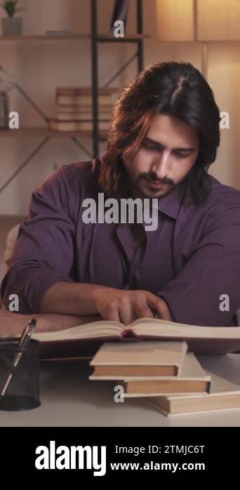 Vertical video. Book research. Home study. Knowledge education. Curious ...