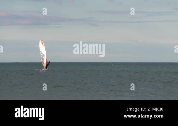 Modern water sport. Hydrofoil ride on the ocean using the wing and the ...