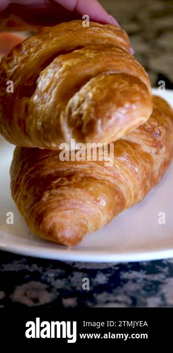 closeup delicious appetizing fresh crunchy croissants sprinkled with ...
