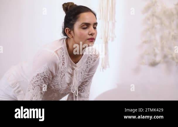 Video of woman doing Mukh Dhauti kriya this exercise helps to increase ...