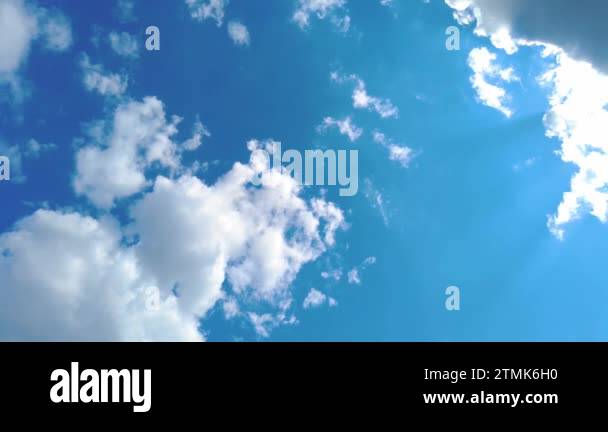 Blue sky white clouds. Puffy fluffy white clouds. Cumulus cloud cloudscape timelapse. Summer ...