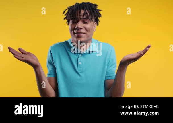 Confused african american man, shoulders up - cant help, makes gesture ...