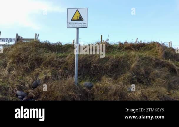 Tide warning sign Stock Videos & Footage - HD and 4K Video Clips - Alamy