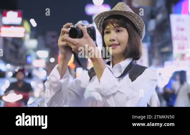 Tourism concept of 4k Resolution. Asian woman taking pictures of city ...