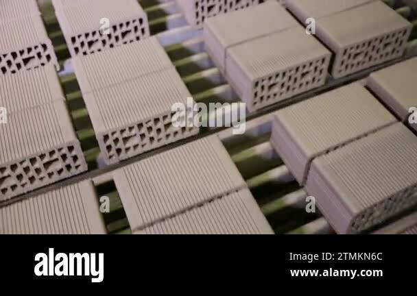 Bricks on the conveyor belt Stock Video Footage - Alamy