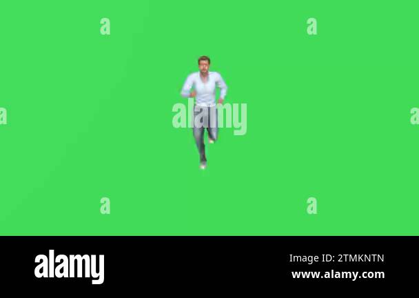 3d young running man on green screen falling down and injured isolated ...