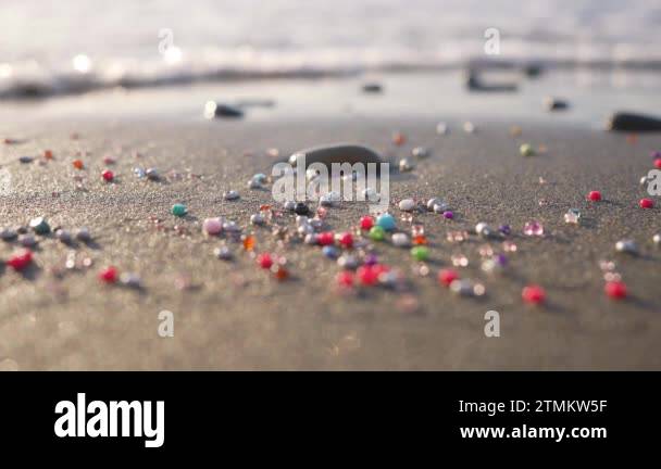 Plastic pollution Garbage and microplastic particles in water Stock ...