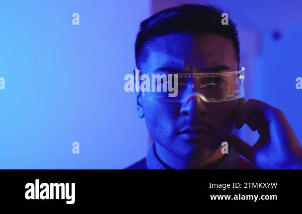 Slow motion video of a chinese man listening while using an augmented ...