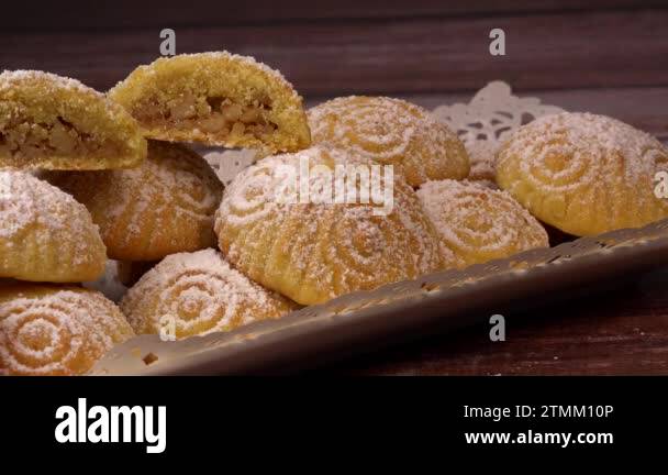 Traditional eid maamoul or mamoul cookies with dates, nuts, and jam ...