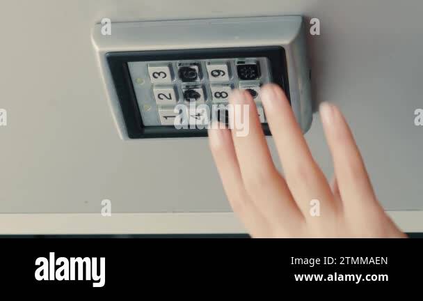 Person opening door using numeric code of access to building. Hand ...