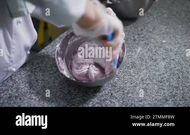 Kitchen in a candy store. Use the blue tool woman mixes syrup pink and ...