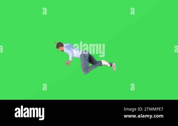 3d young man on green screen falling down and injured isolated ...
