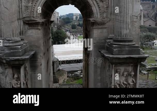 White marble Arch of Septimius Severus at northwest end of Roman Forum ...