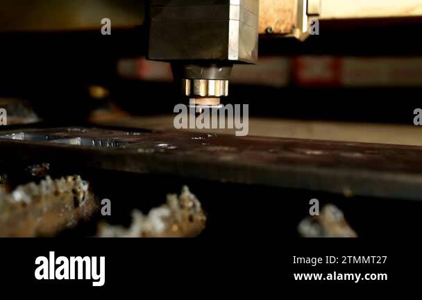 Cut sheet metal at workshop. Modern tool in heavy industry. Automatic ...